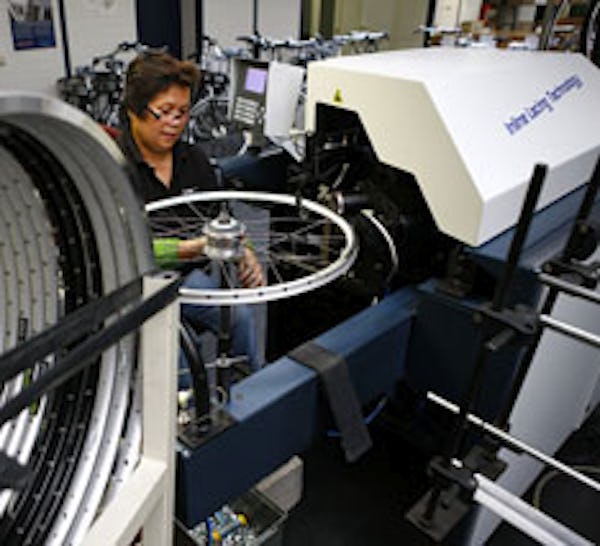 Holland Mechanics Prepares Multicycle For E-Bike Wheel Building